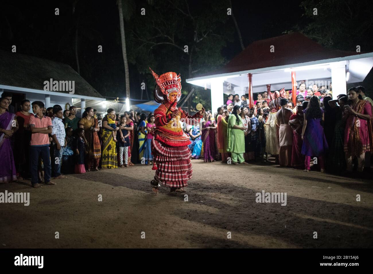 Theyyam performer, as a living god, dances a popular ritual form of ...