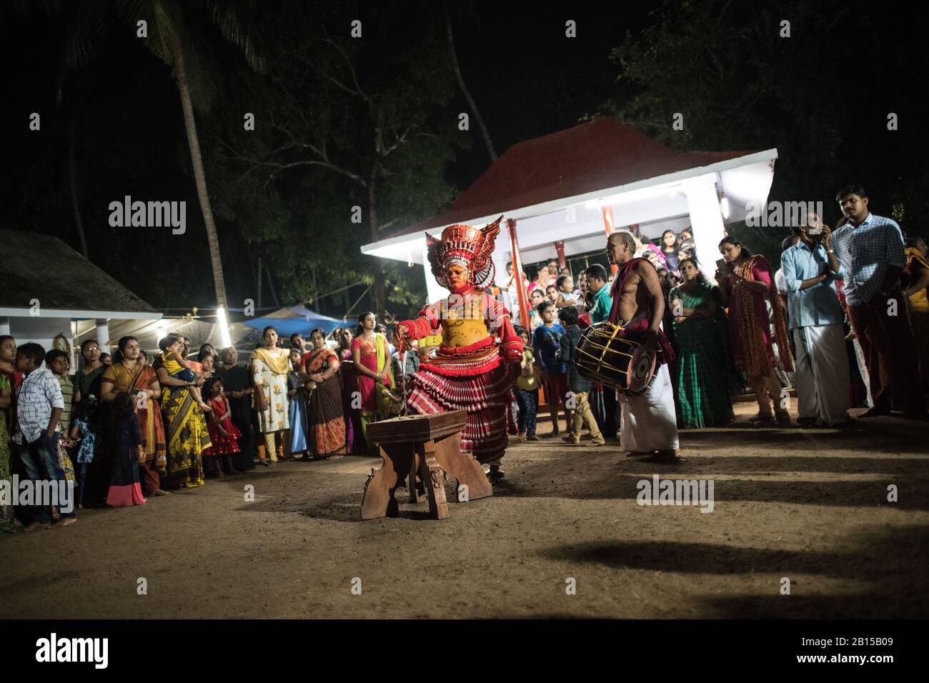 Theyyam performer, as a living god, dances a popular ritual form of ...