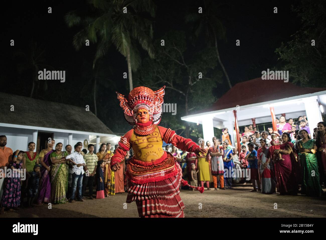 Theyyam performer, as a living god, dances a popular ritual form of ...