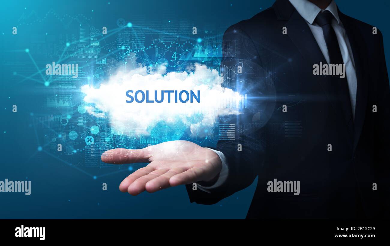 Hand of Businessman holding SOLUTION inscription, successful business ...