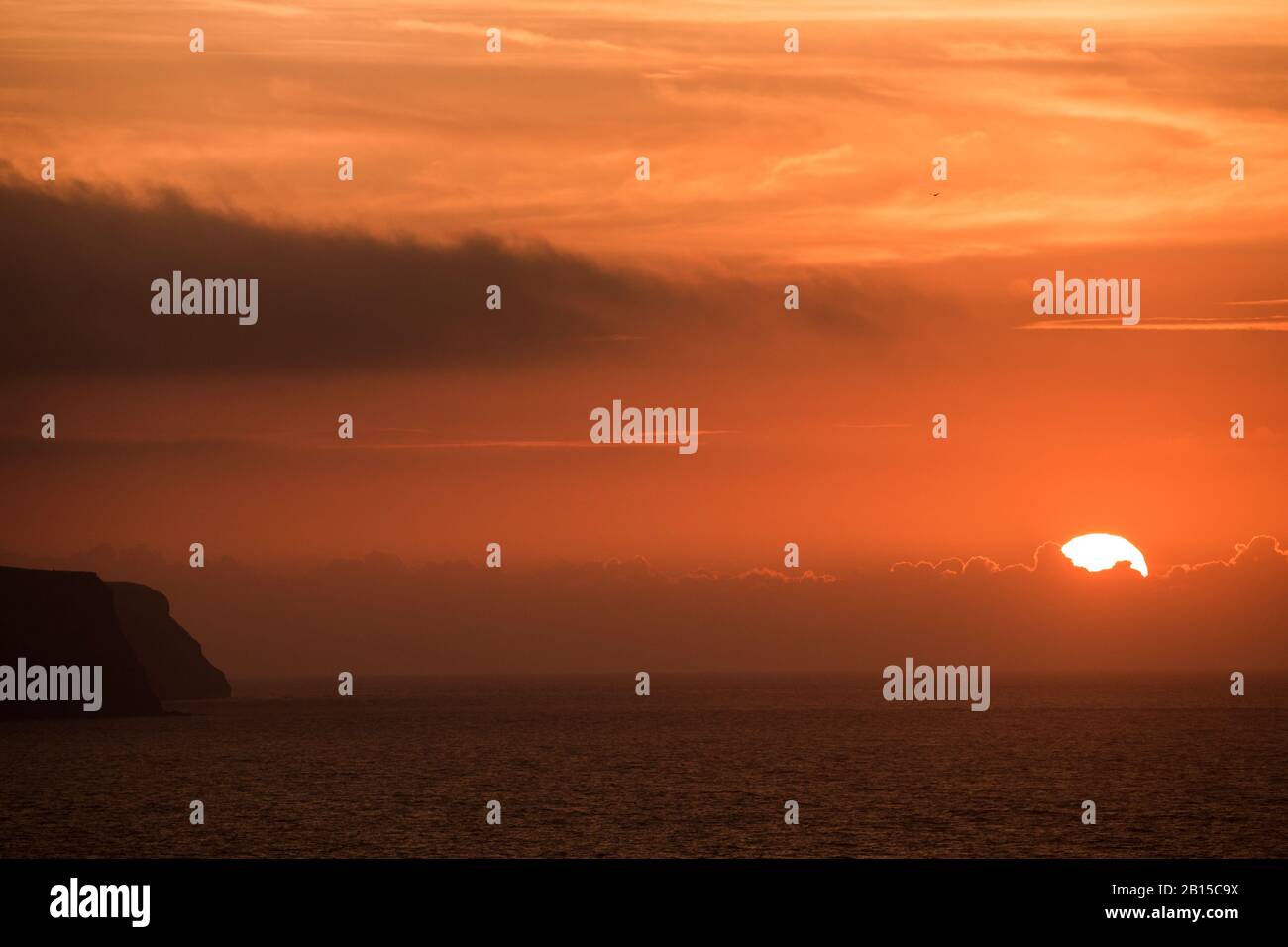 Sequence of images of a sunset, over the sea, sunset sequence, Whitby ...