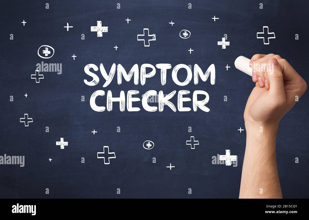 Hand drawing SYMPTOM CHECKER inscription with white chalk on blackboard ...