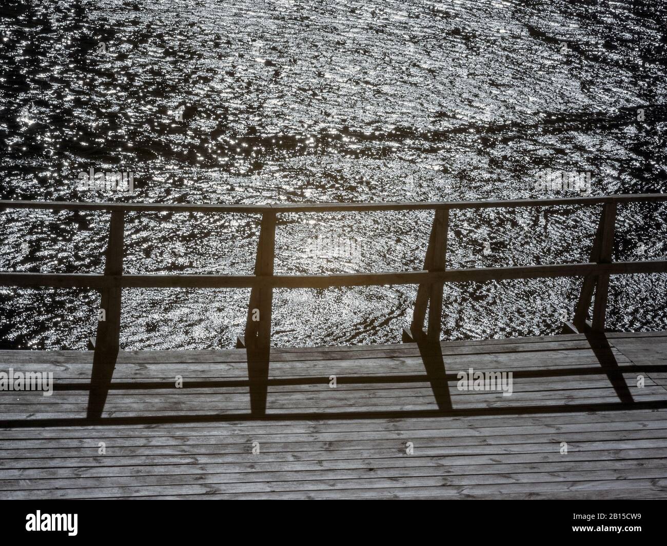 unusual landscape with wooden bridge over river, infrared photo taken ...