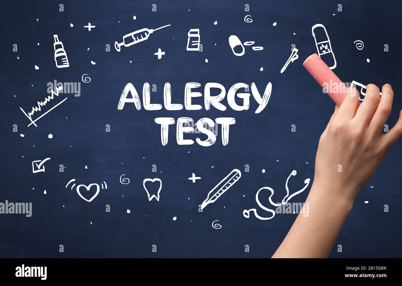Hand drawing ALLERGY TEST inscription with white chalk on blackboard ...