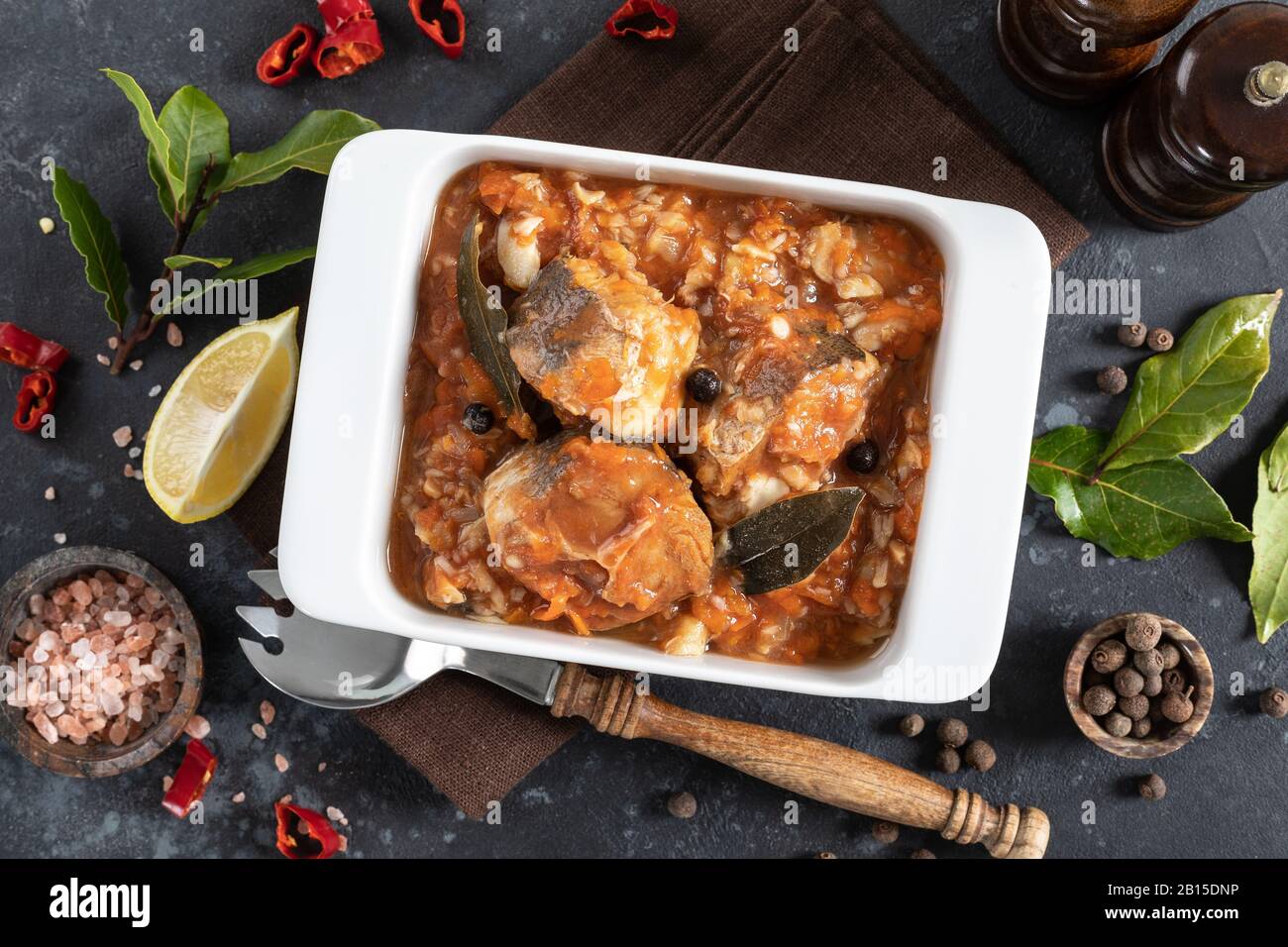 Hake fish, cooked in tomato sauce with vegetables and spices Stock ...