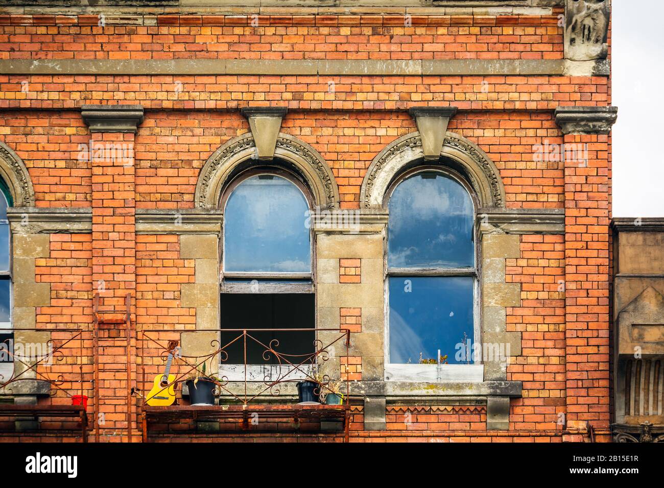 Side wall of vintage brick building with windows in Auckland, New ...