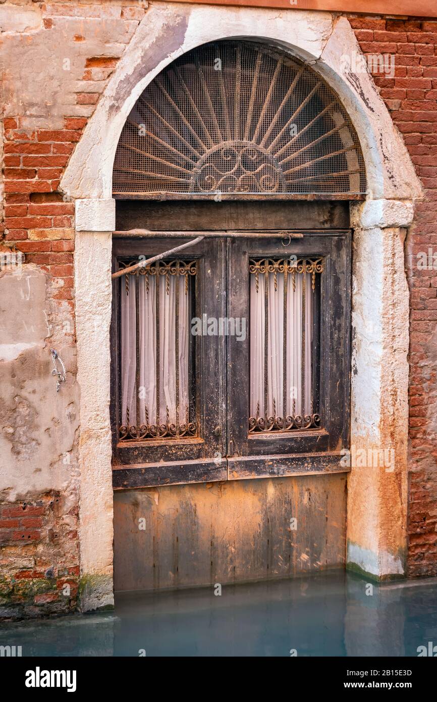 Picturesque wooden door at the famous Venice, Italy Stock Photo - Alamy