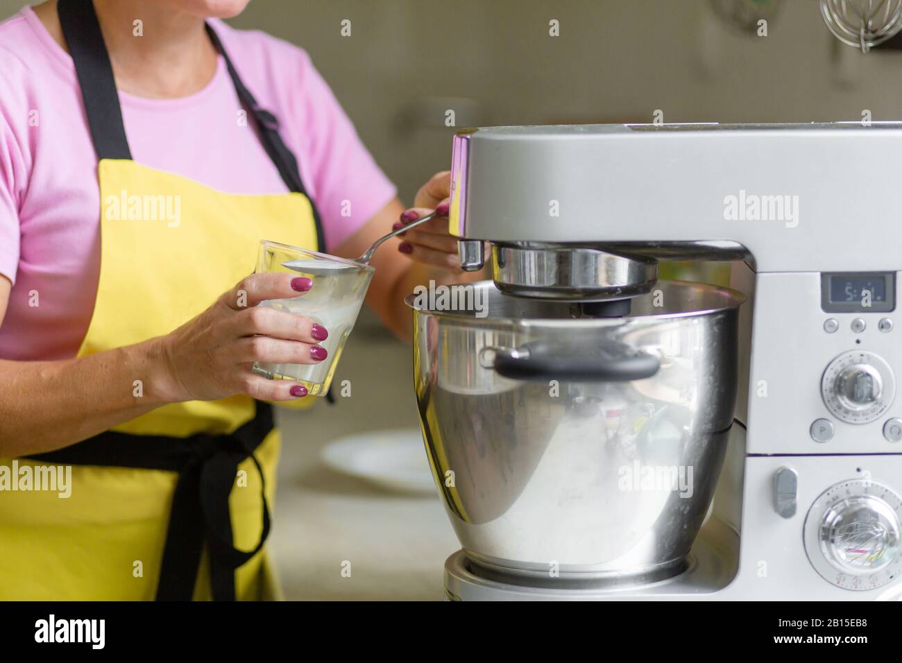Professional pastry chef woman mixes hi-res stock photography and ...