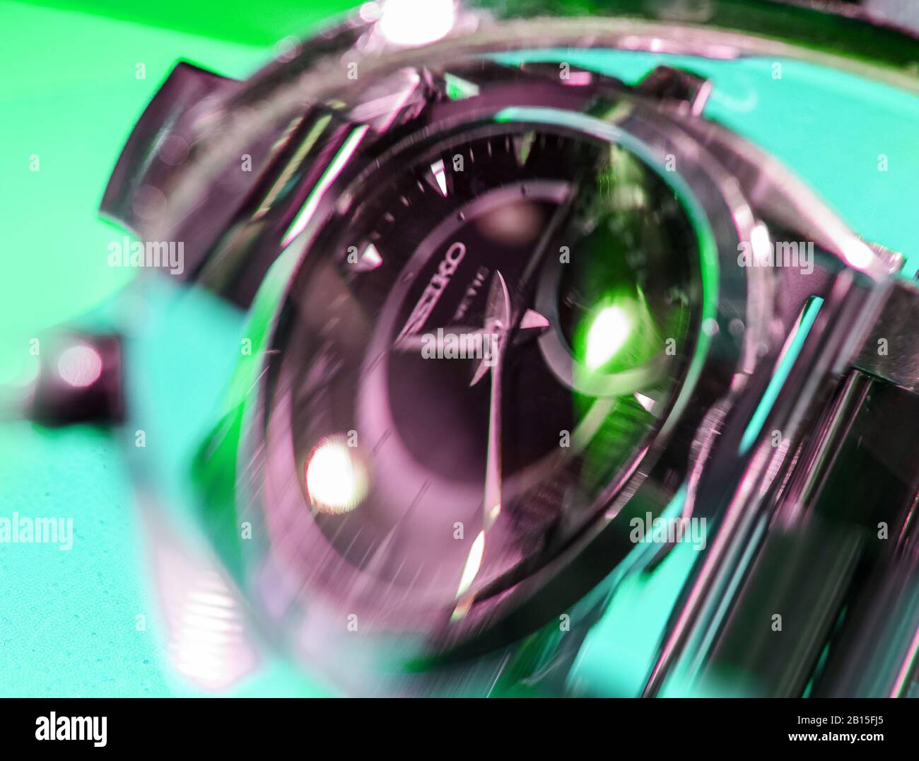 A stainless steel bracelet watch for men seen in close-up with optical ...