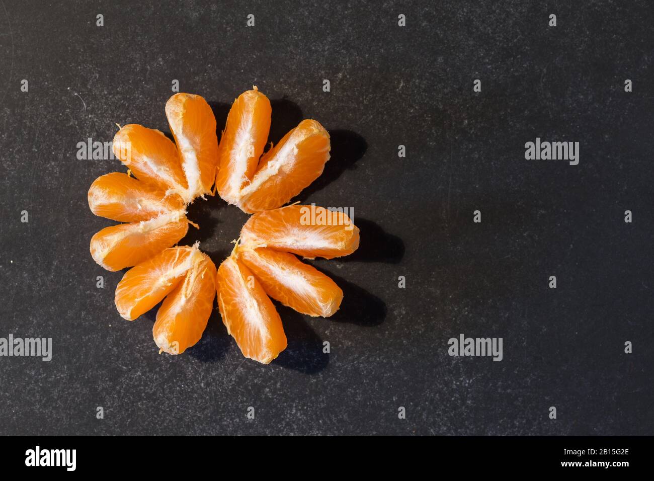 mandarin orange for healthy vegetarian or vegan eating Stock Photo - Alamy