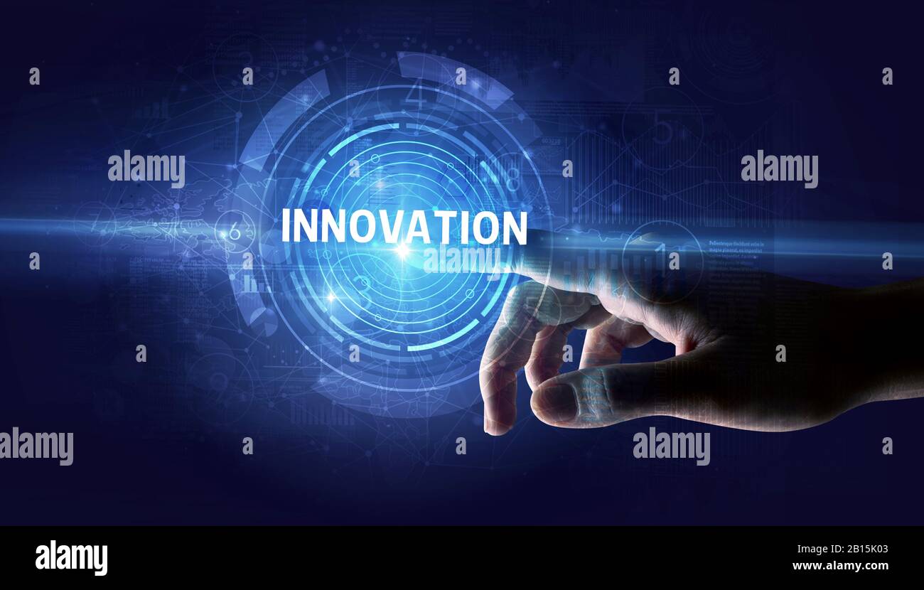 Hand touching INNOVATION button, modern business technology concept ...