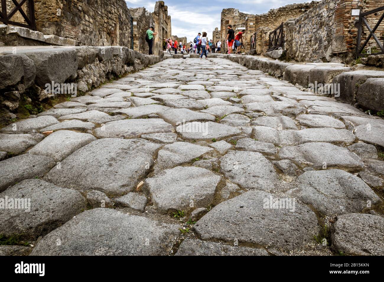 POMPEII, ITALY - MAY 13, 2014: The ancient street. Pompeii is an ...
