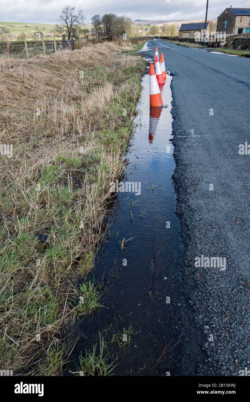 Road wear due to wet conditions hi-res stock photography and images - Alamy