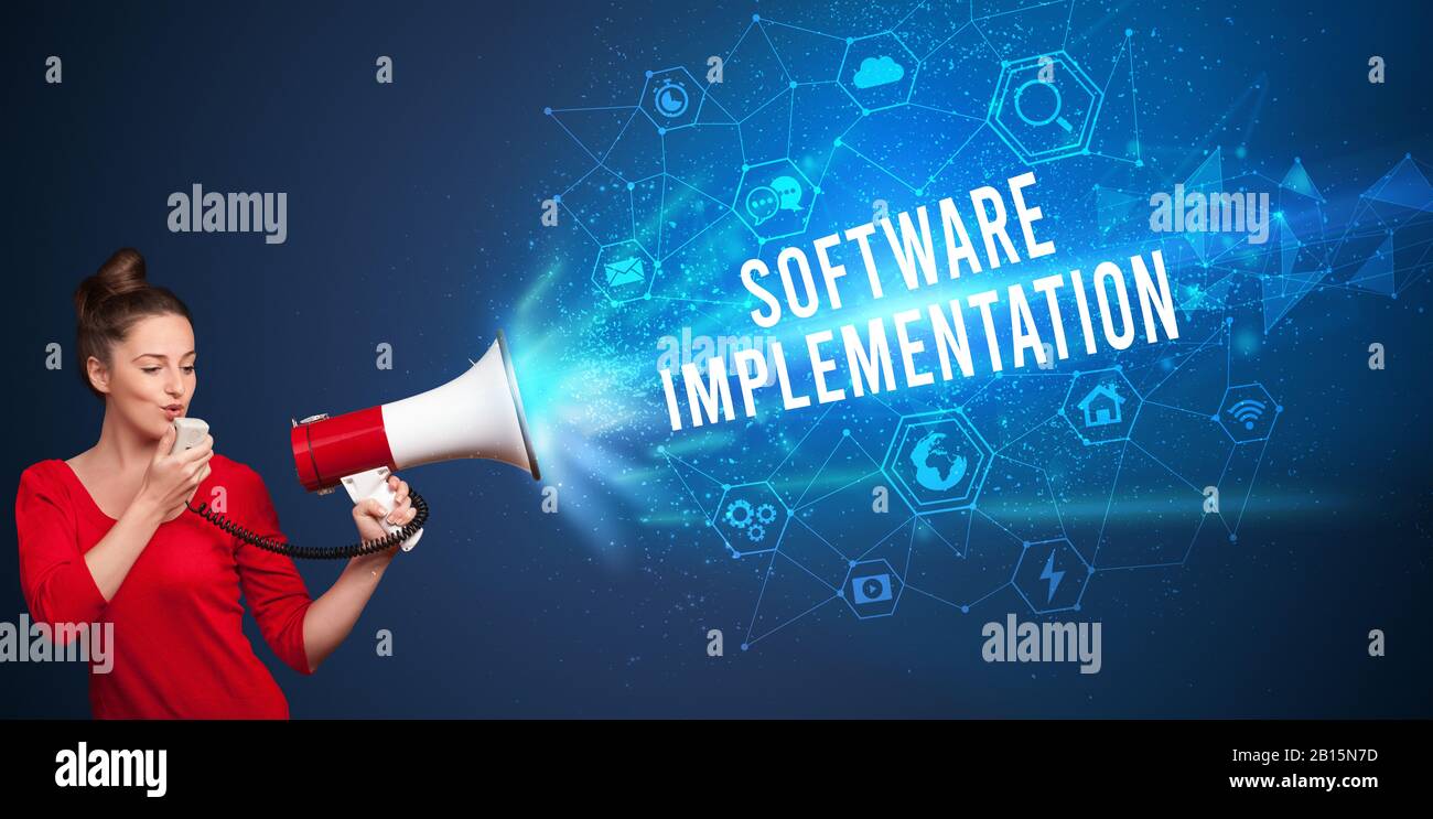 Young woman shouting in megaphone with SOFTWARE IMPLEMENTATION ...
