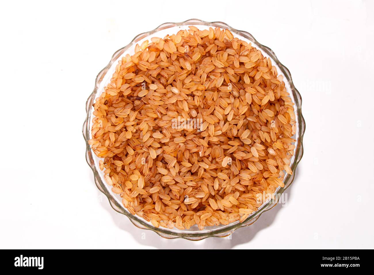 Close up Rice devzira Red with white background Stock Photo - Alamy