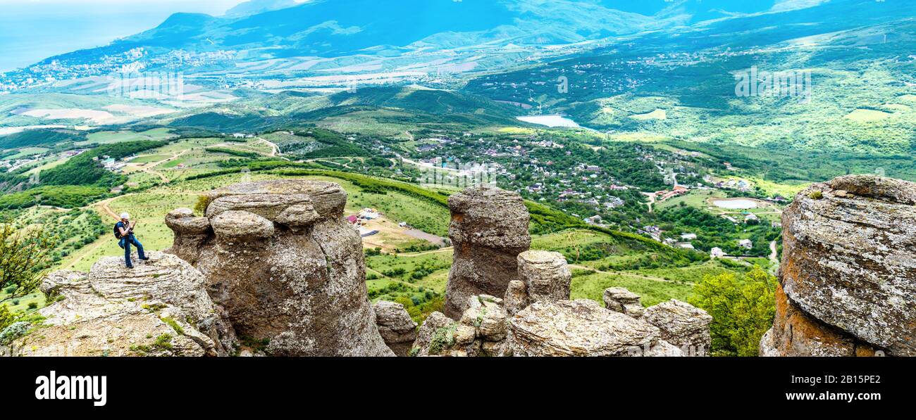 Landscape of Crimea, Russia. Person stands on bizarre stones of the ...