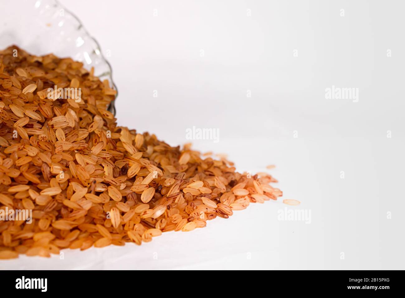 Close up Rice devzira Red with white background Stock Photo - Alamy
