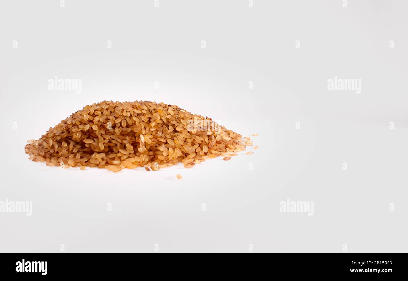 Close up Rice devzira Red with white background Stock Photo - Alamy