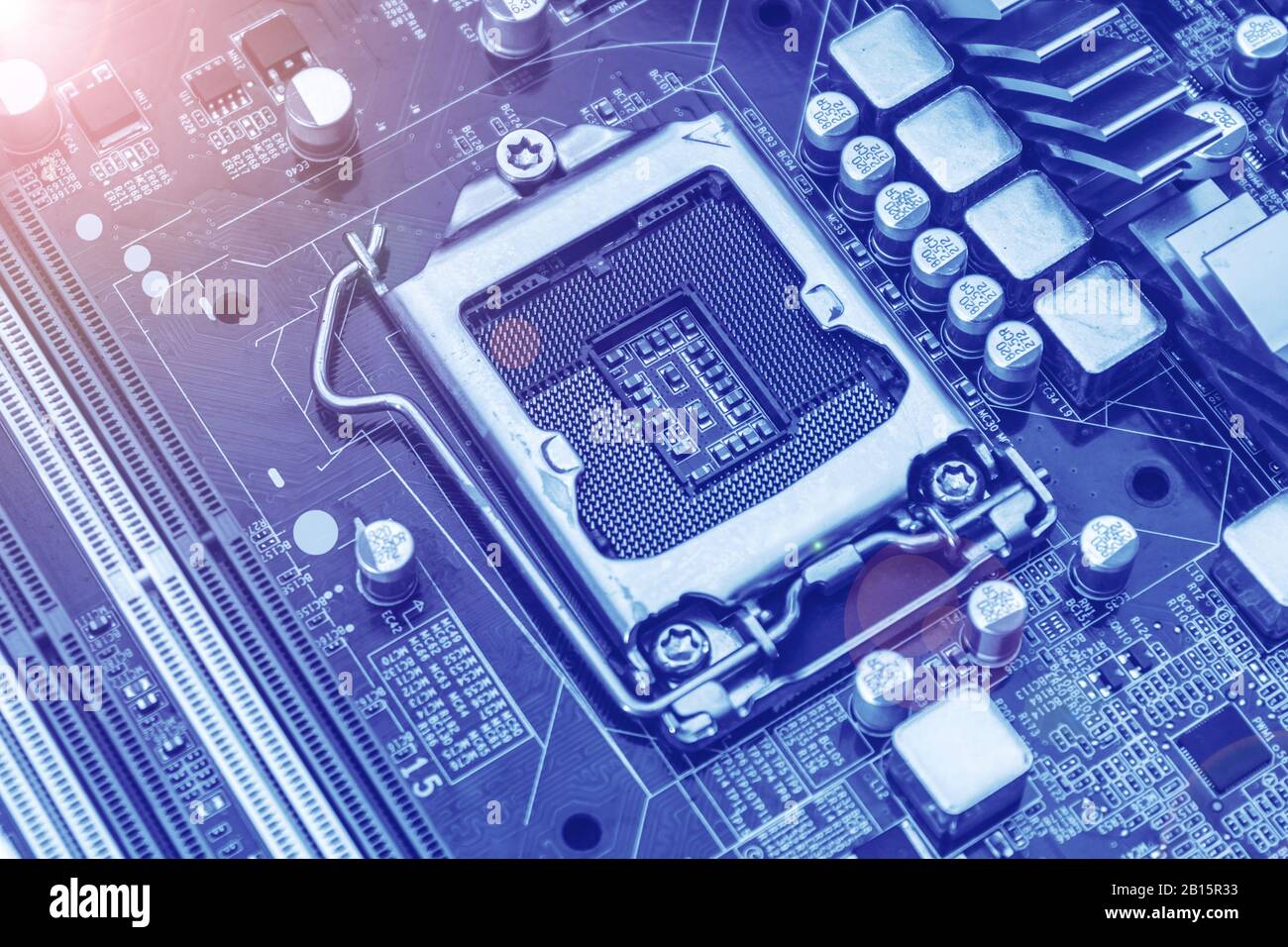 Computer motherboard and its processor socket close-up with tinted and glow effect Stock Photo ...