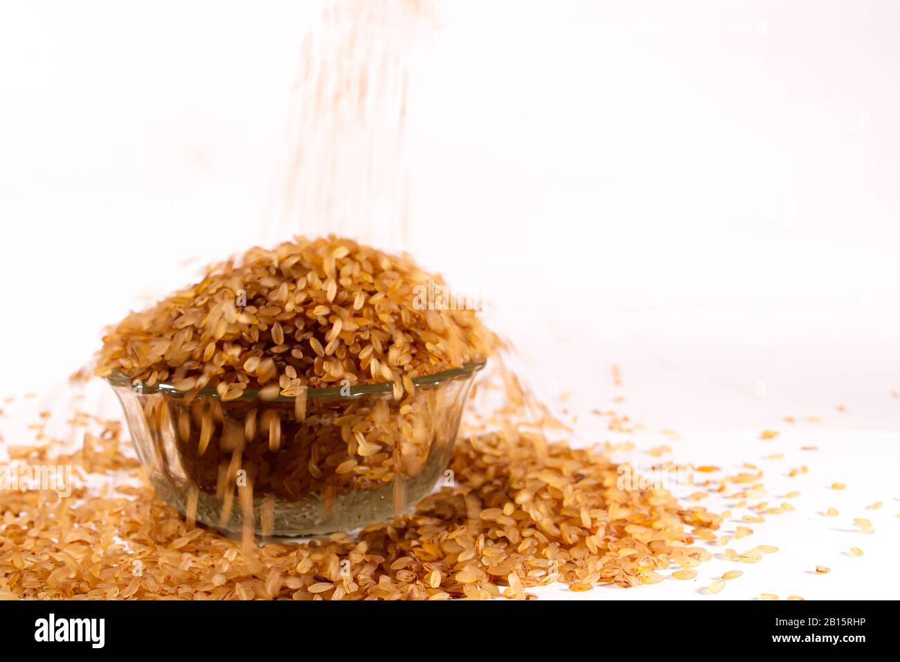 Close up Rice devzira Red with white background Stock Photo - Alamy