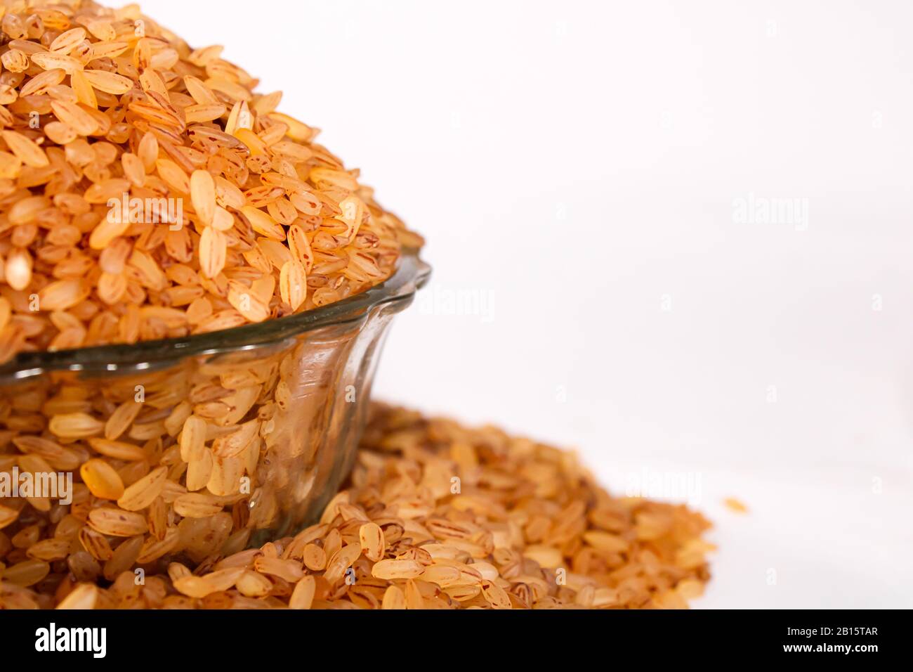 Close up Rice devzira Red with white background Stock Photo - Alamy