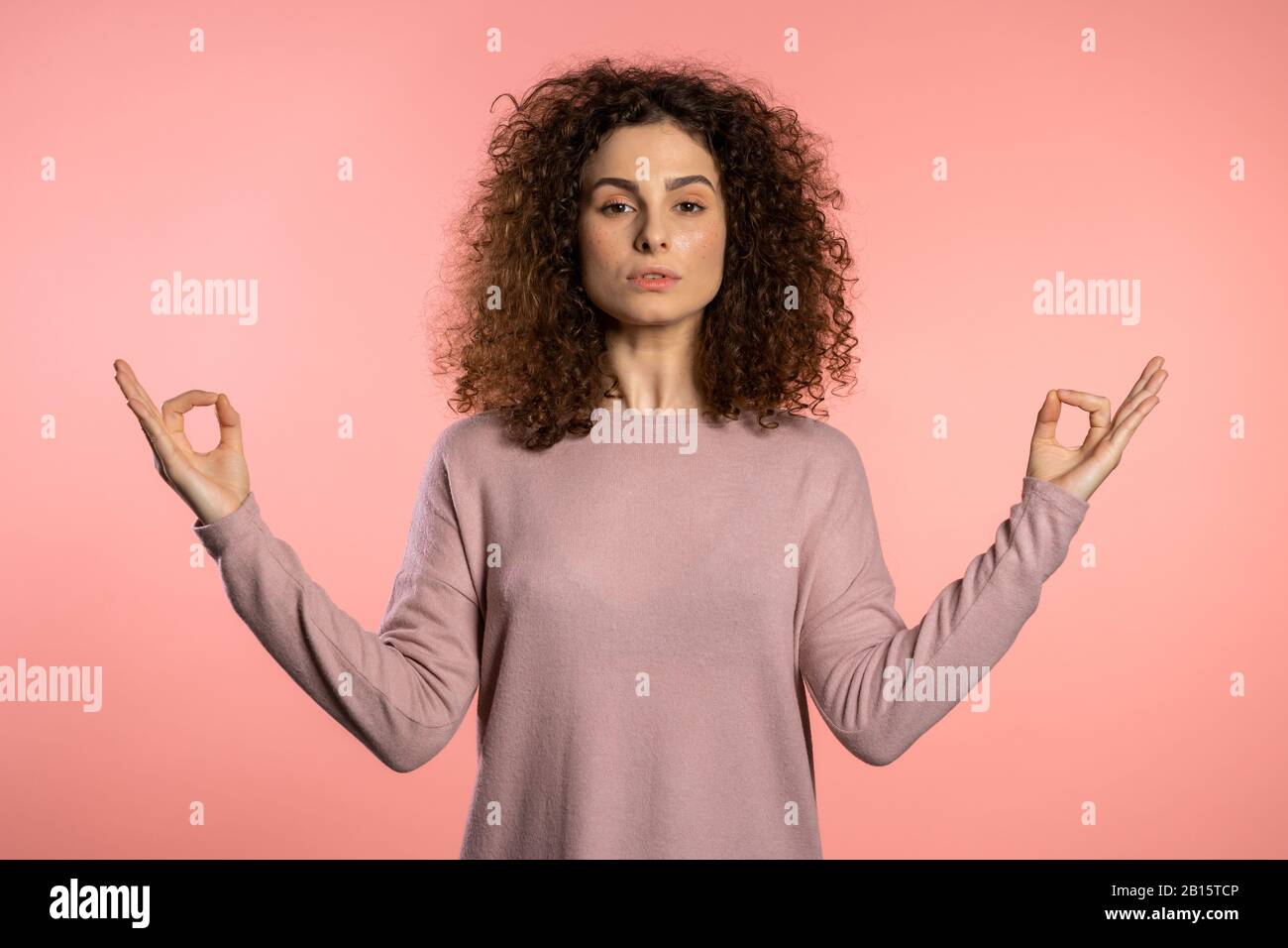 Positive girl relaxing, meditating. Woman calms down, breathes deeply ...