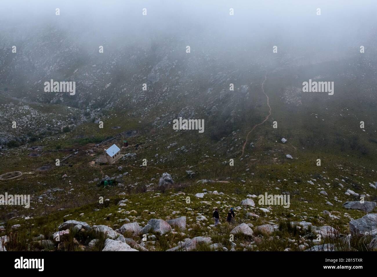 Rising fog over mountain cabin Stock Photo - Alamy