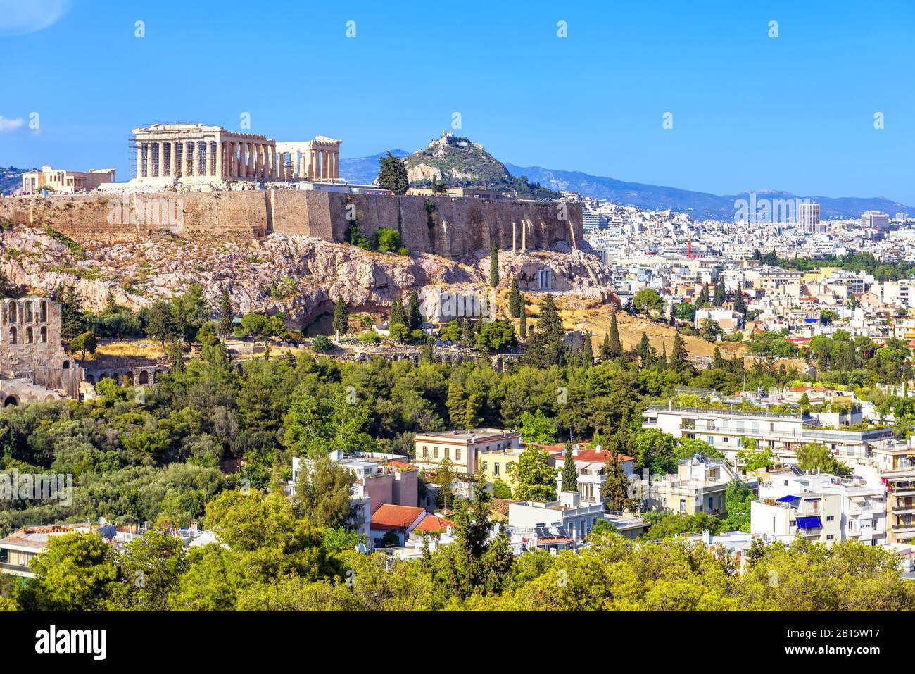 Athens in summer, Greece. Famous Acropolis hill rises above cityscape ...
