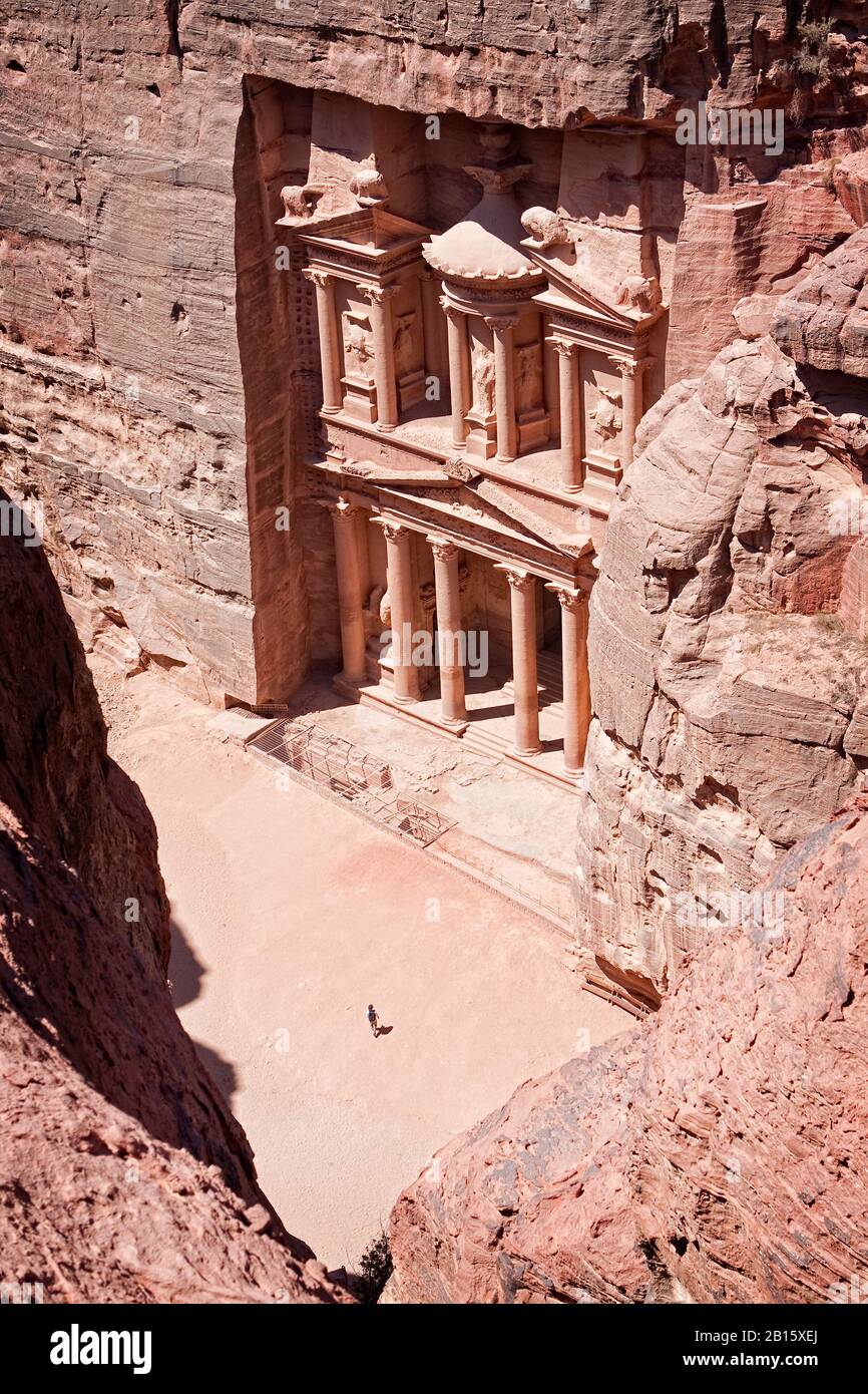 a man only reaches the treasure of petra, creating scale effect Stock ...
