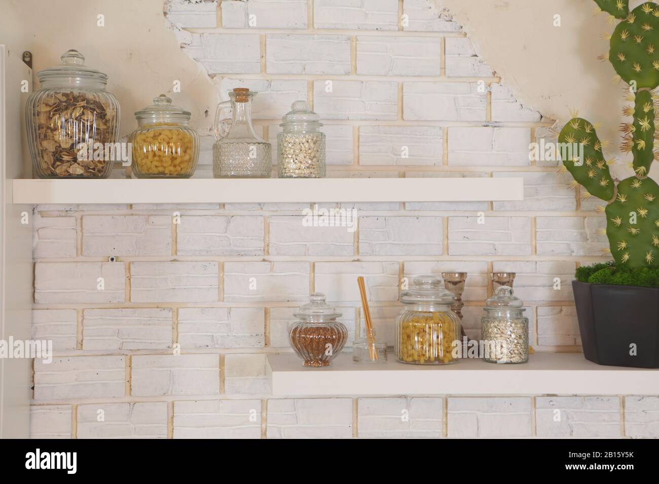 Spices on the kitchen shelf Stock Photo - Alamy