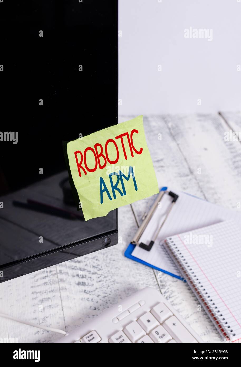 Writing note showing Robotic Arm. Business concept for programmable ...
