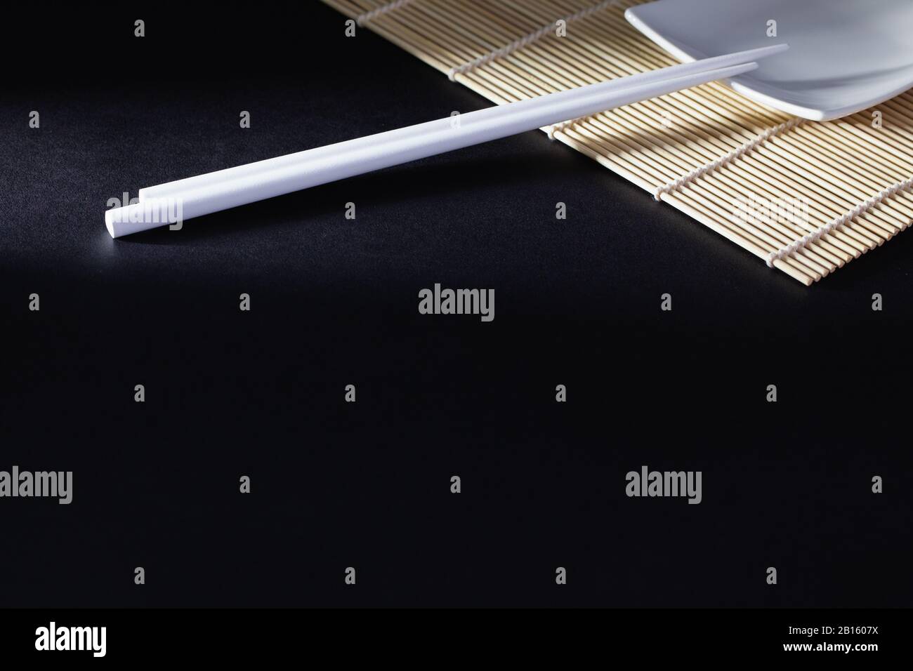 Top View Of White Empty Sushi Plate With Bamboo Chopsticks and Mat ...