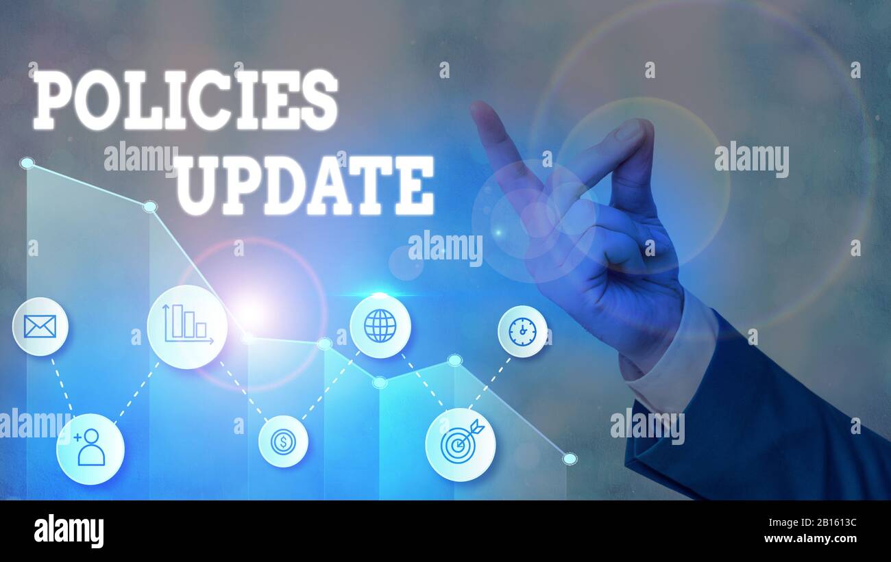 Writing note showing Policies Update. Business concept for act of adding new information or ...