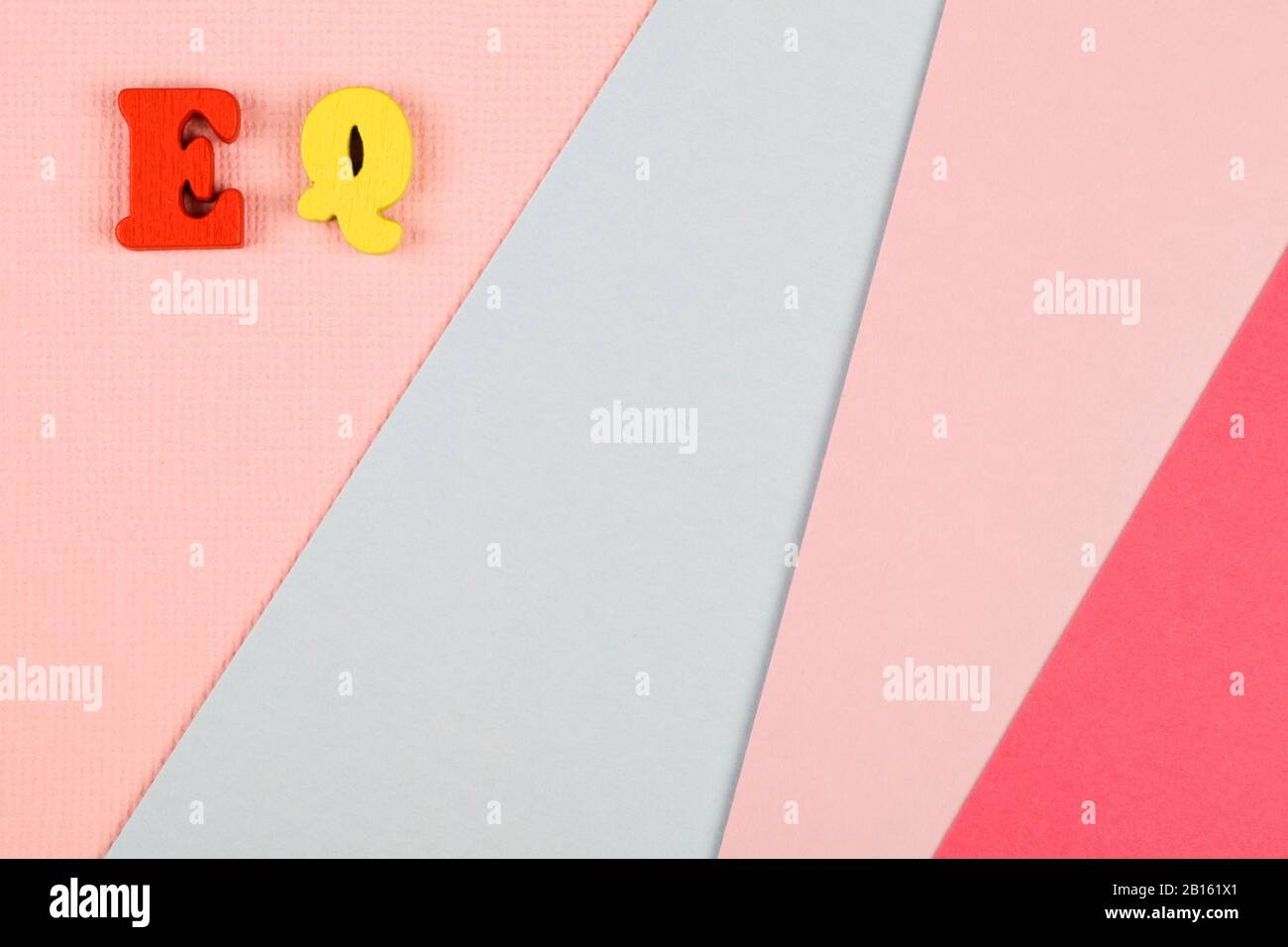 Colorful Wooden Word ' EQ ' or Emotional Quotient. copy space close up ...