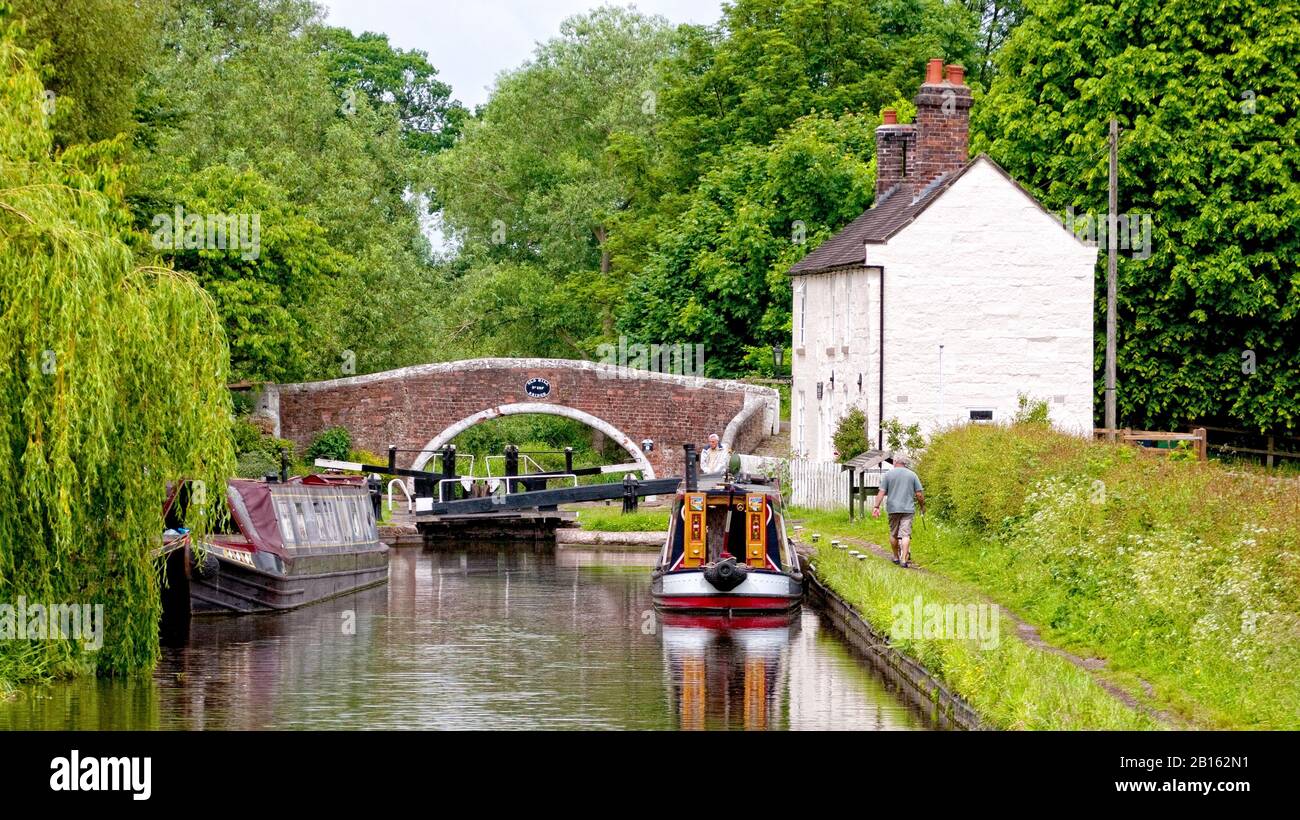 Narrowboat about to go through Tixall Lock on the Staffordshire and ...