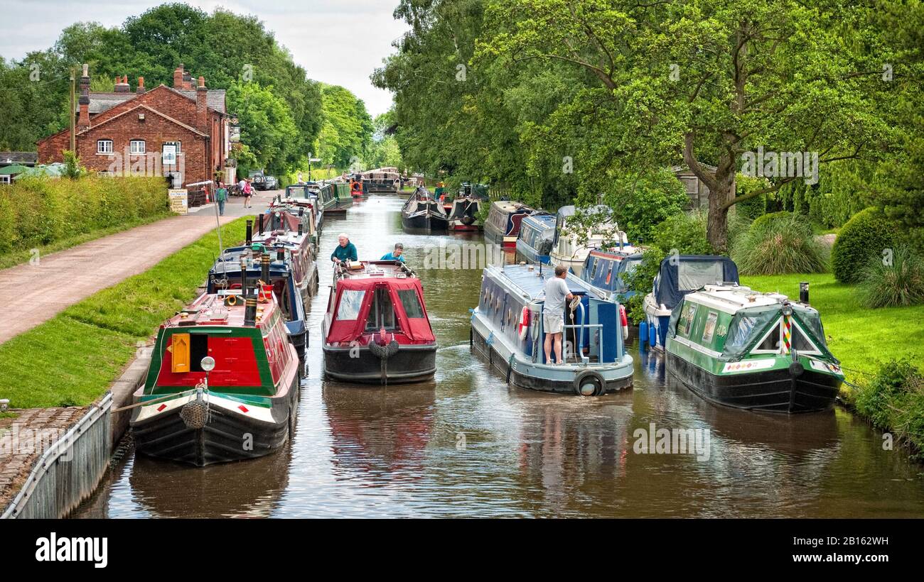 Narrowboats cruising along the Trent and Mersey Canal at Fradley ...