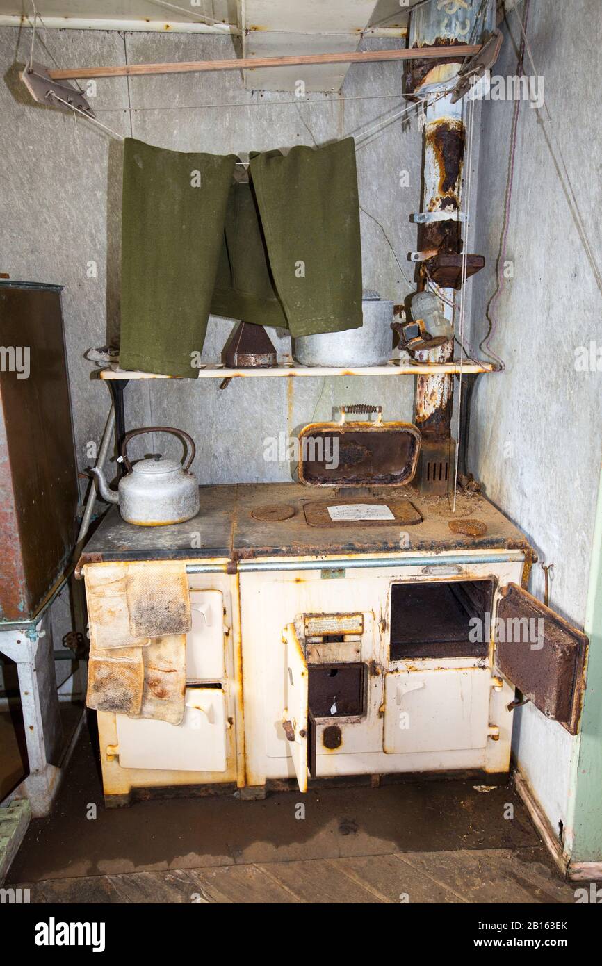 Trousers drying above the kitchen stove in Station W, an old British ...