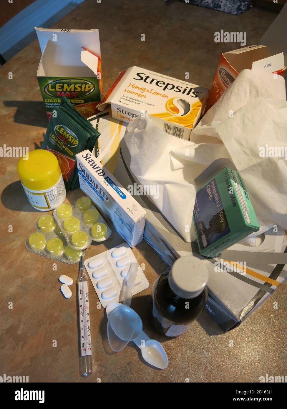 Variety of over-the-counter medicines to keep in the kitchen cupboard ...