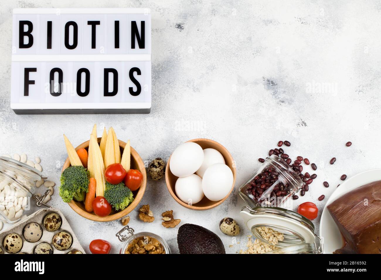 Food rich in biotin. food : tomato eggs walnuts beans corn avocado ...