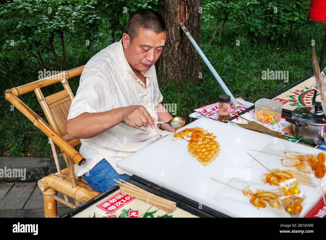 Man making candy hi-res stock photography and images - Alamy
