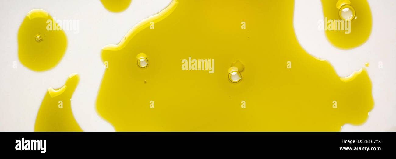 splash of hemp seed oil on a white plate, superfood and healthy eating ...