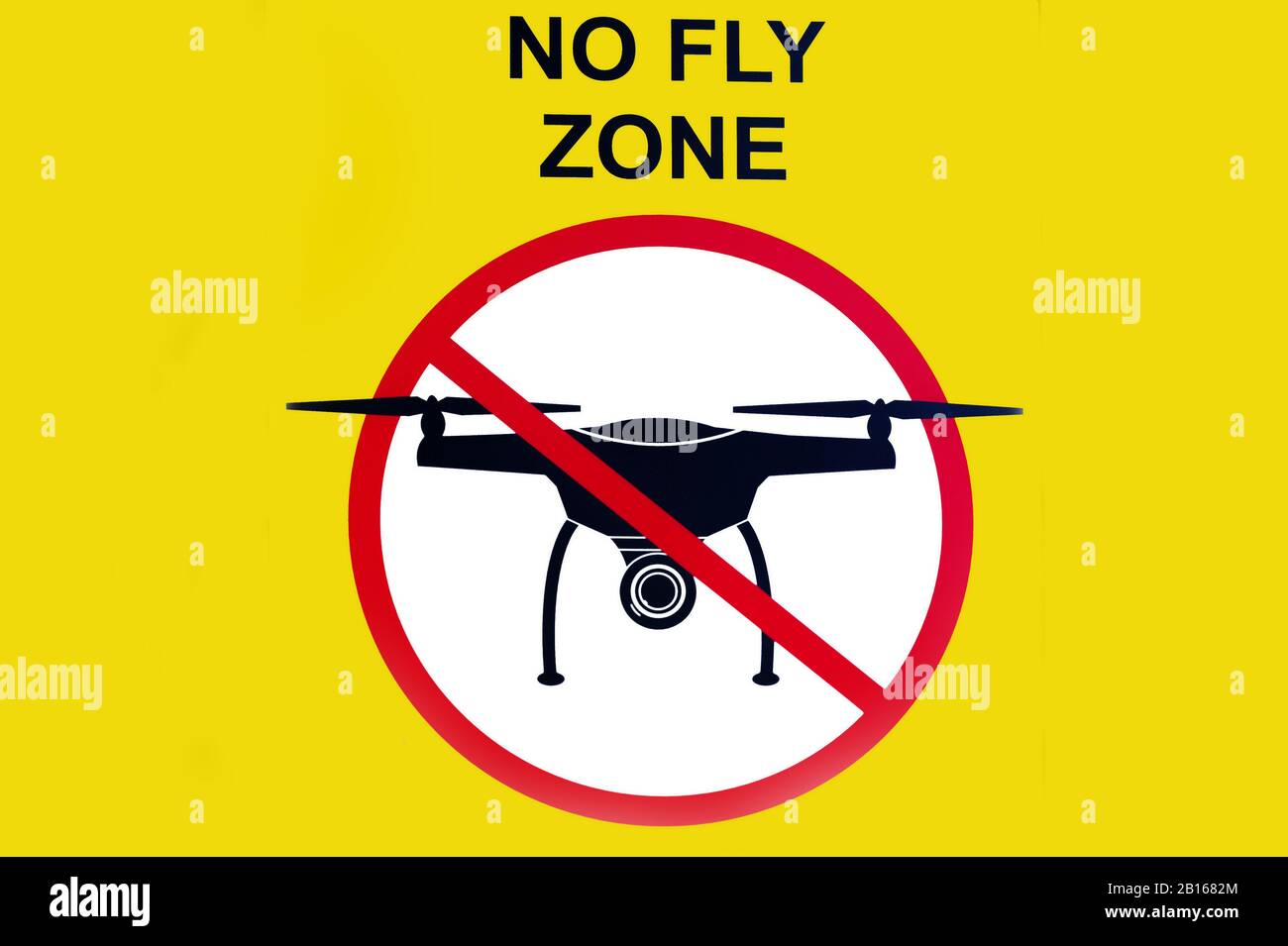 Signboard NO FLY ZONE with a picture of a dithered droning Stock Photo ...