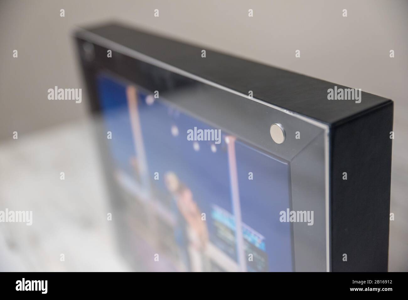 Corner view of black album box with magnetic plexiglass lid with ...