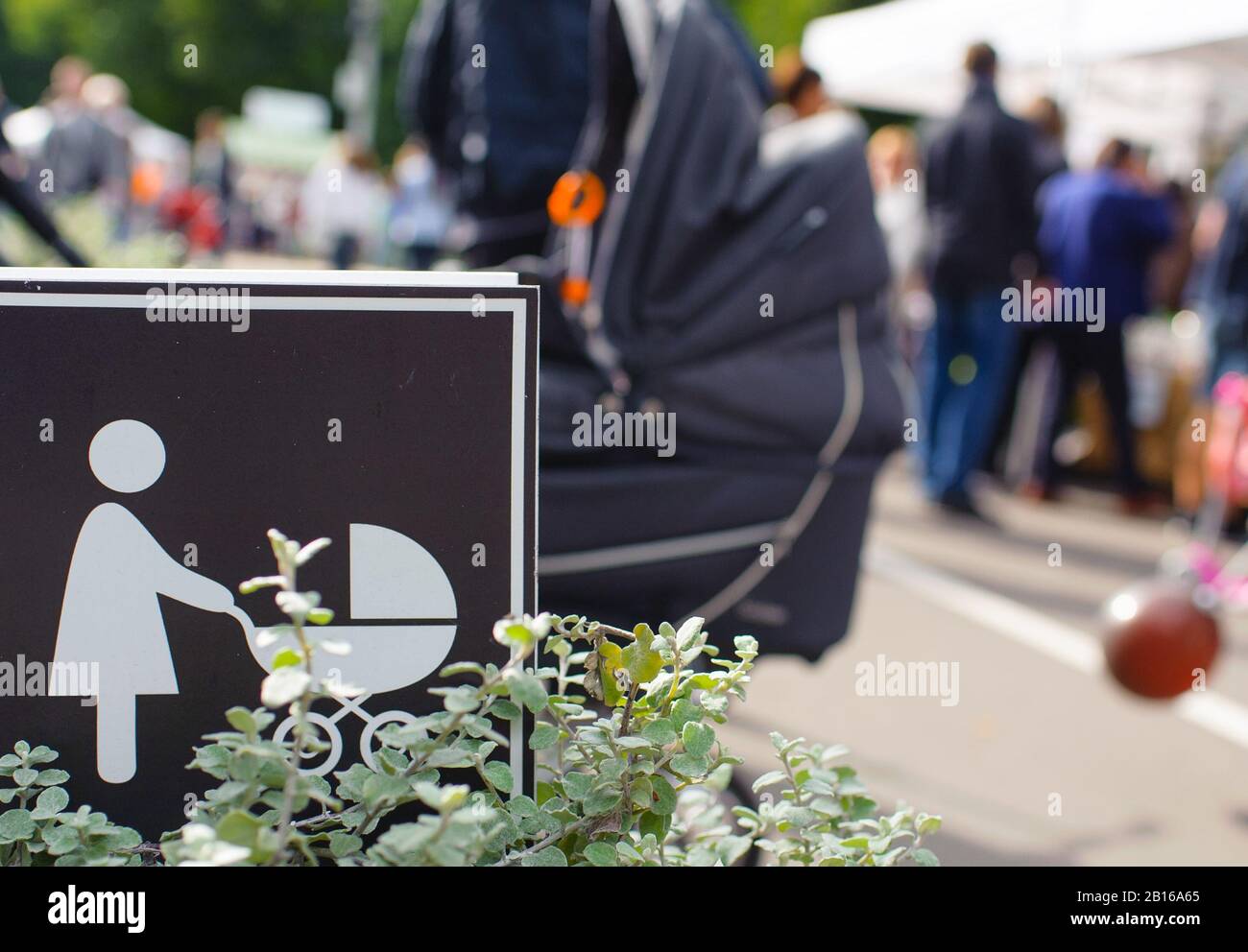 Sign path for moms with strollers in the park Stock Photo - Alamy