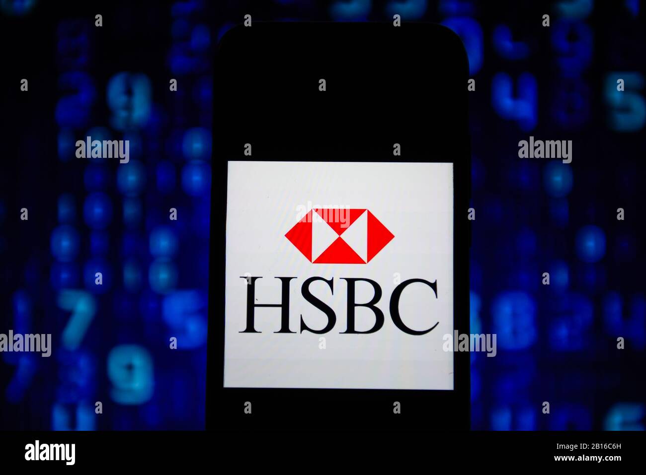 In this photo illustration a HSBC bank logo seen displayed on a ...