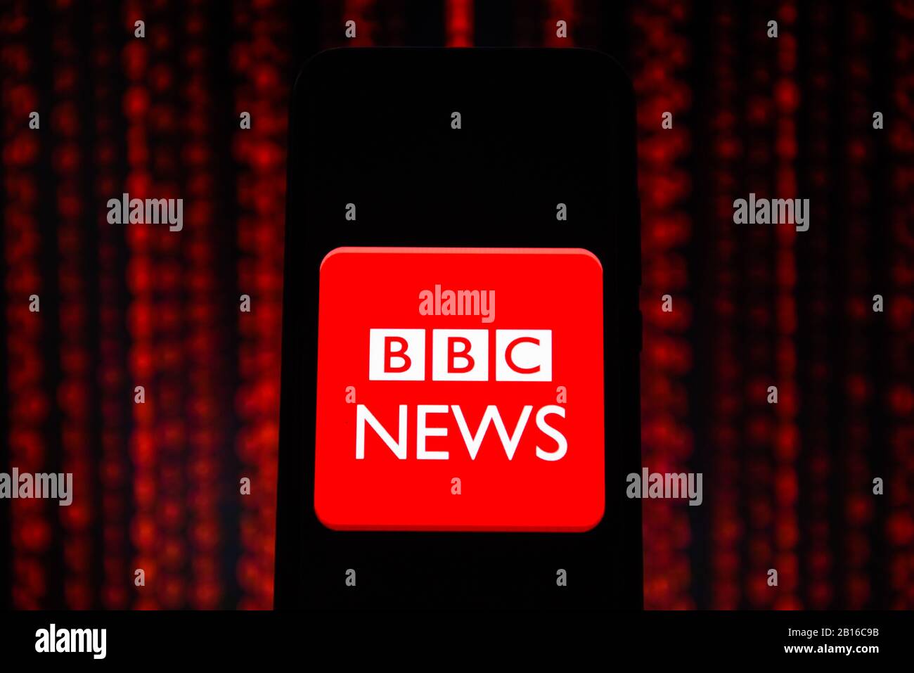 In this photo illustration a BBC news logo seen displayed on a ...