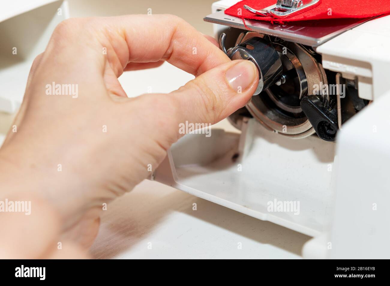 Woman sew working on electric hi-res stock photography and images - Alamy