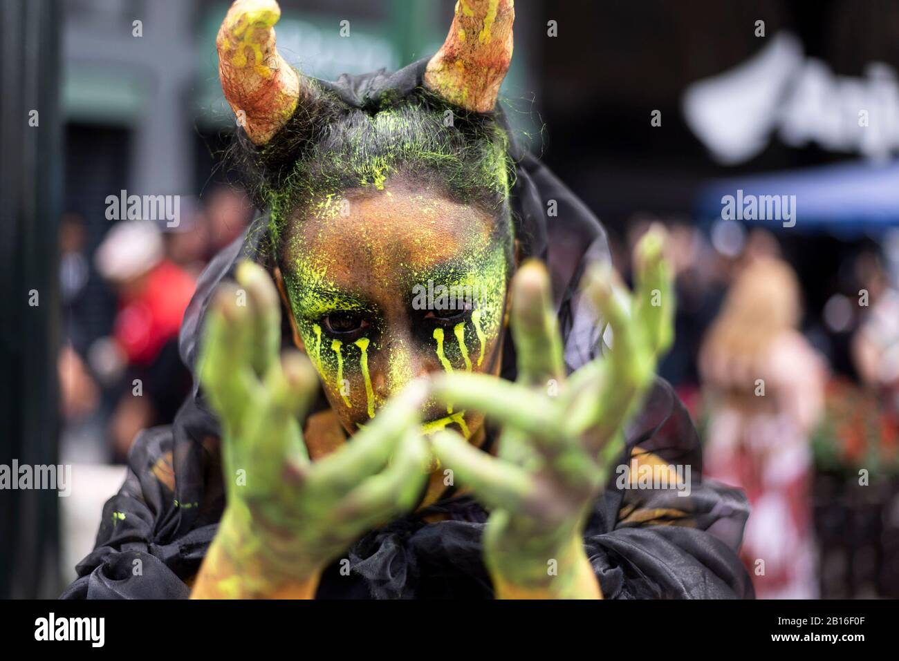 Curitiba, Brazil. 23rd Feb, 2020. A participant in the Zombie Walk has ...