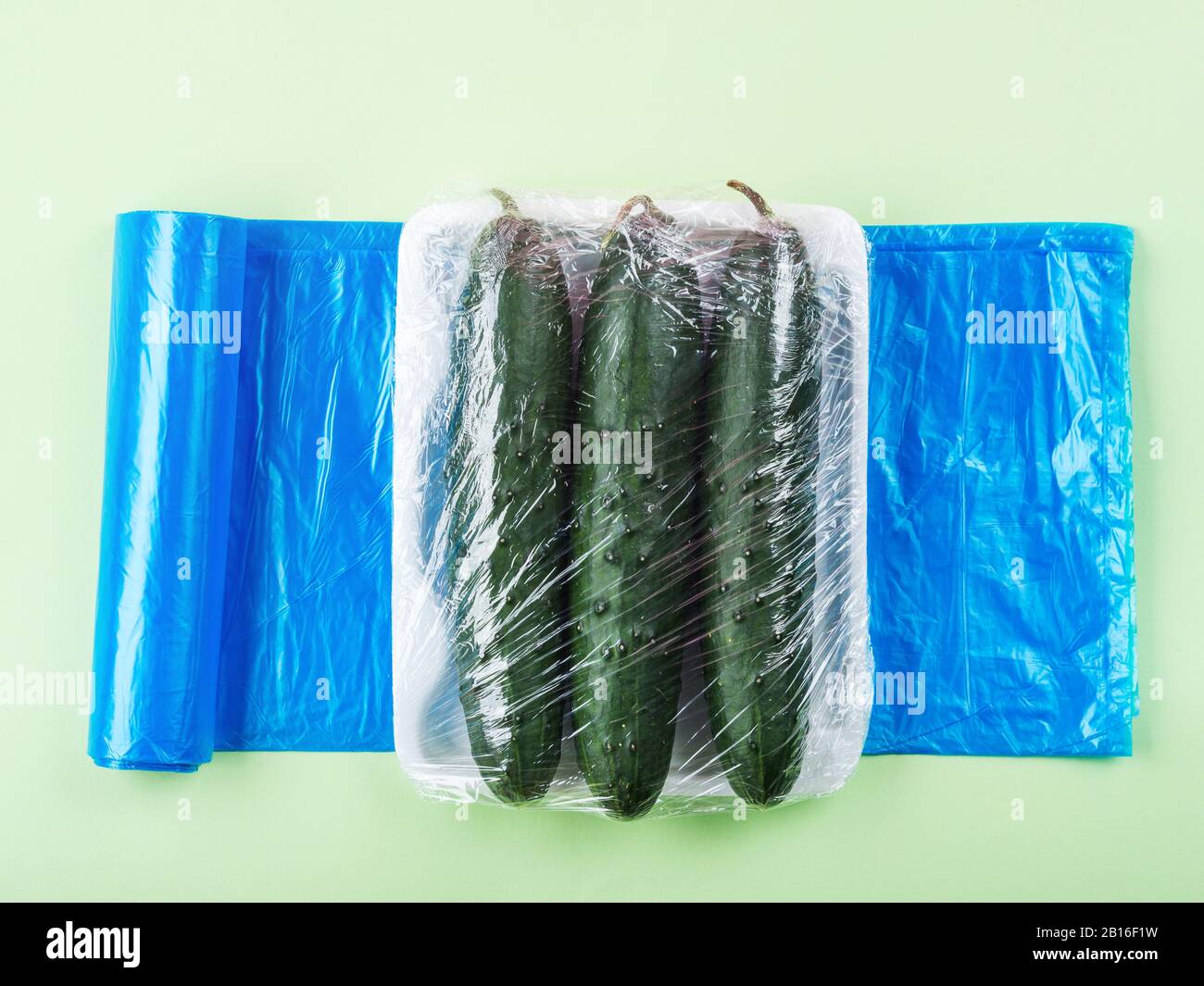 Fresh produce wrapped in plastic film Stock Photo - Alamy