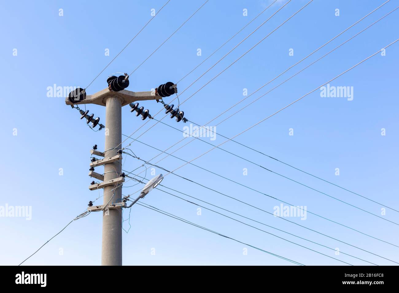 Cables and insulators on the power pole in Turkey Stock Photo - Alamy